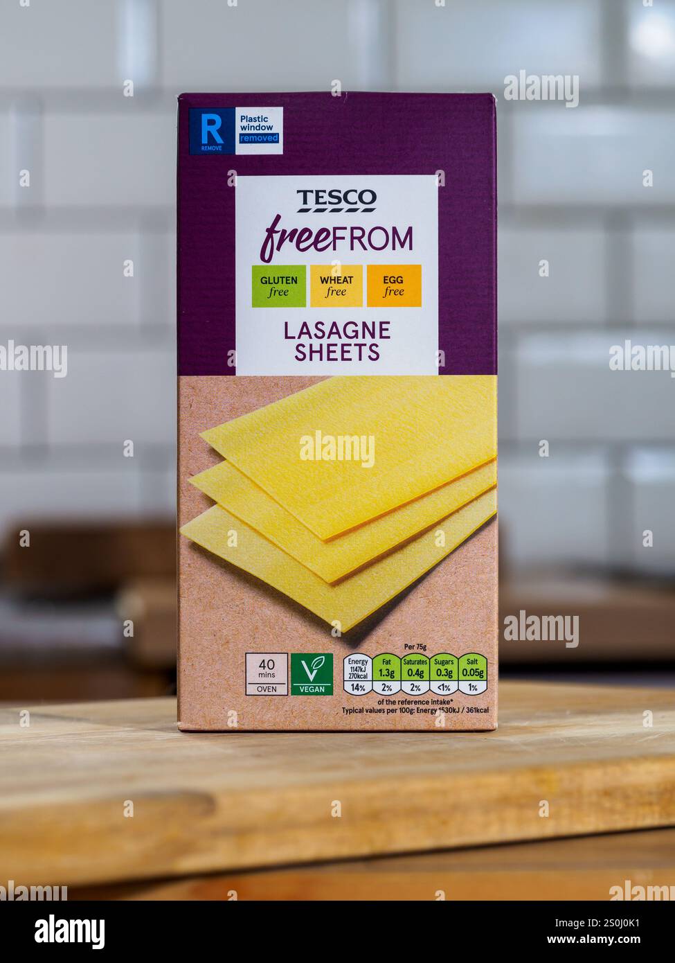 Gluten-free lasagne sheets in a kitchen setting. The package highlights ...
