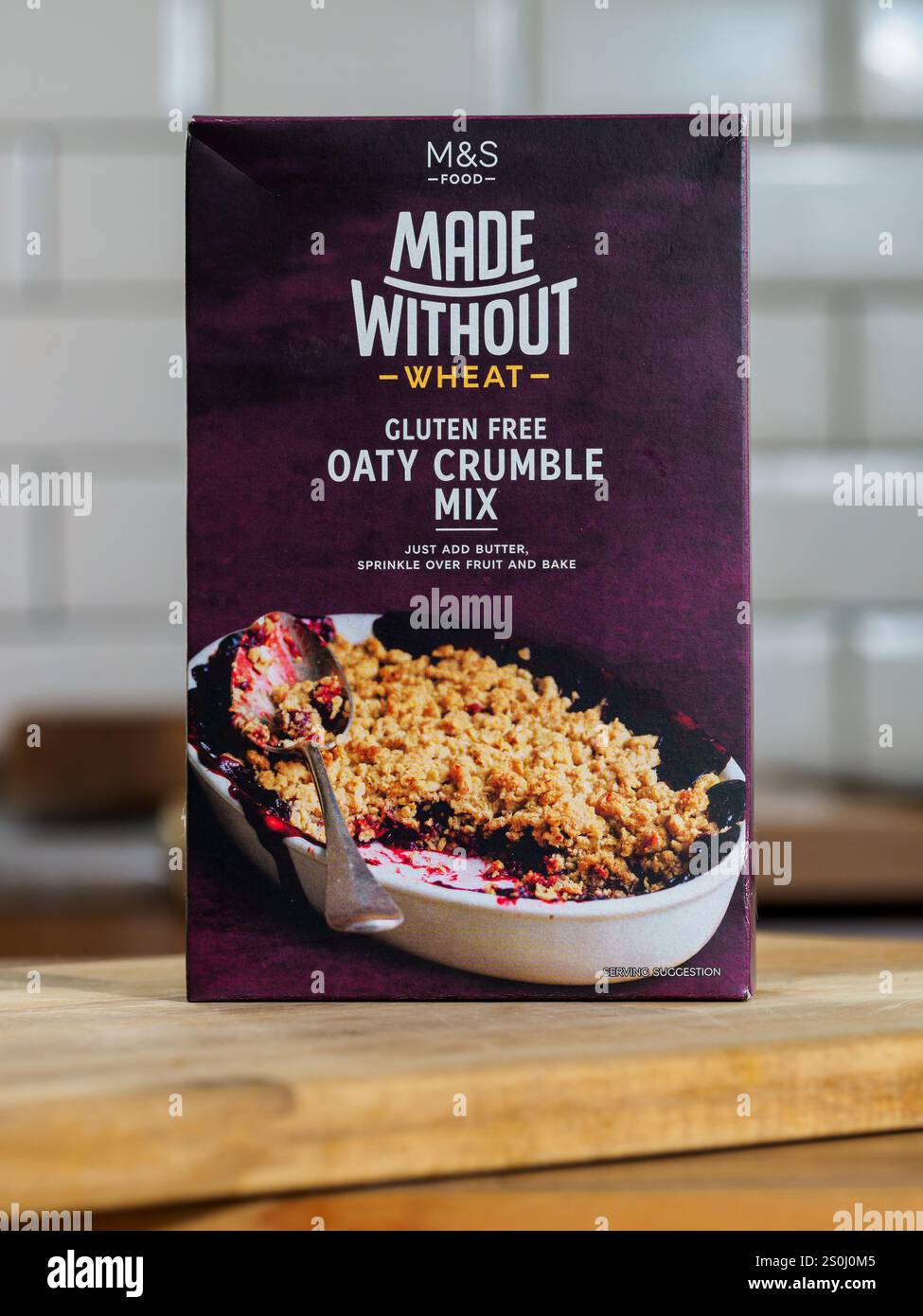 Gluten-free oaty crumble mix on kitchen counter Stock Photo - Alamy
