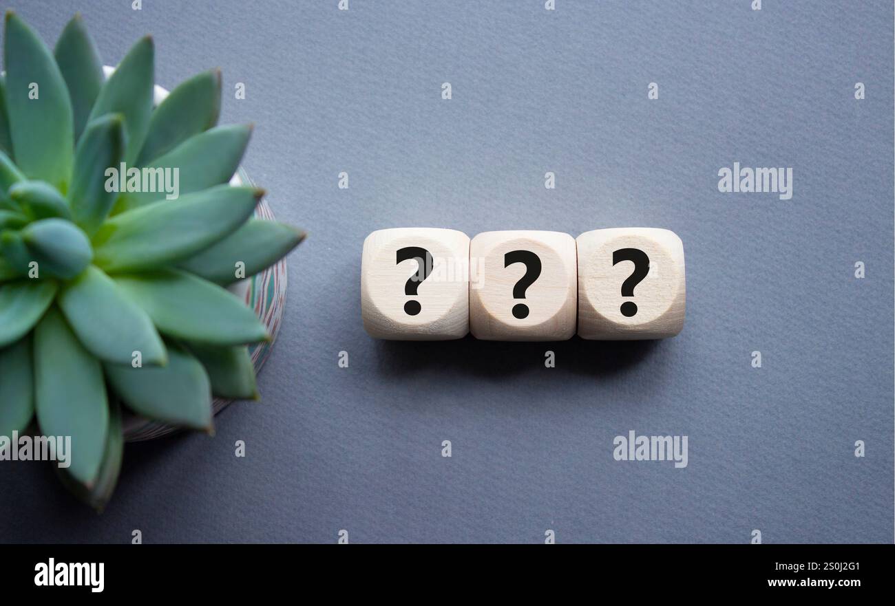 Question marks symbol. Concept words question mark on wooden cube ...