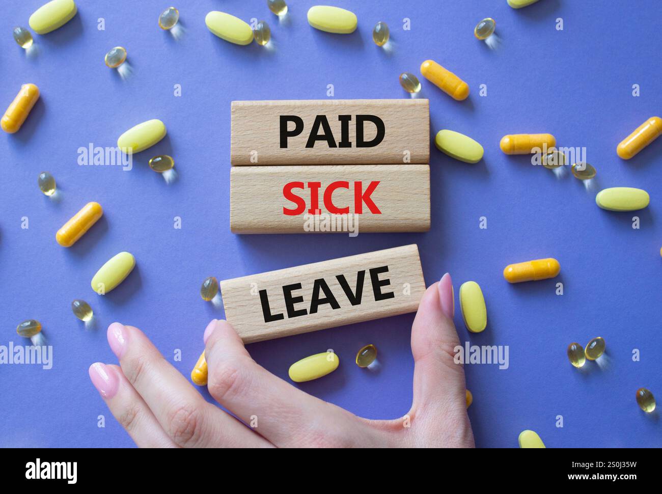 Paid Sick Leave symbol. Concept words Paid Sick Leave on wooden blocks ...