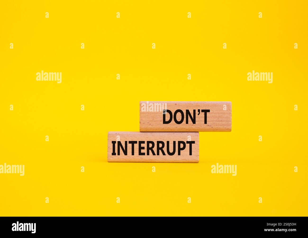 Dont interrupt symbol. Concept word Dont interrupt on wooden blocks ...
