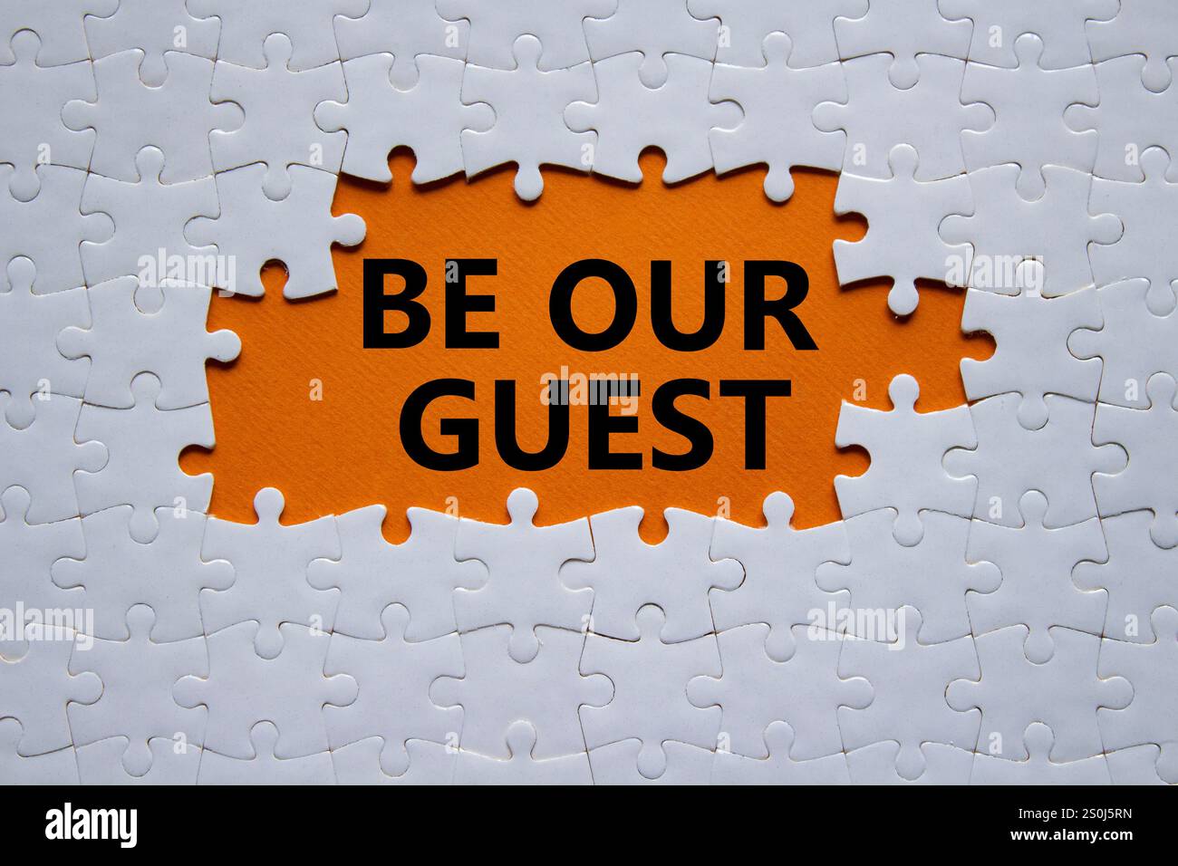 Be our guest symbol. Concept words Be our guest on white puzzle ...