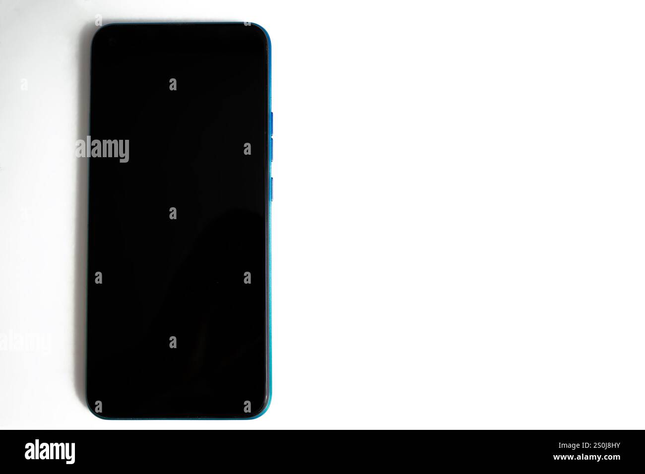 A sleek smartphone is positioned on a plain white surface, showcasing ...