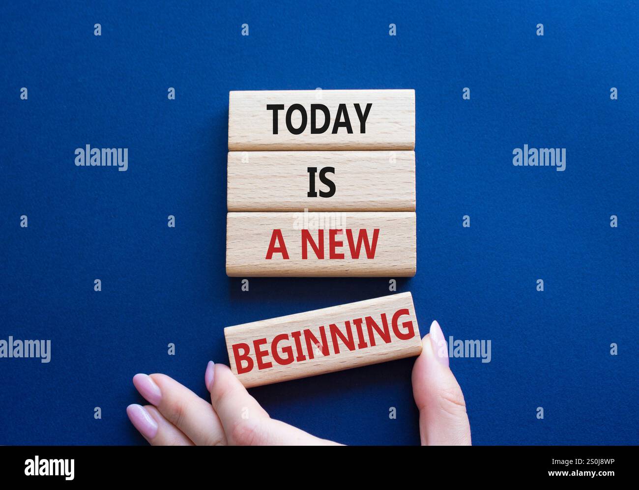 Today is a new beginning symbol. Wooden blocks with words Today is a ...