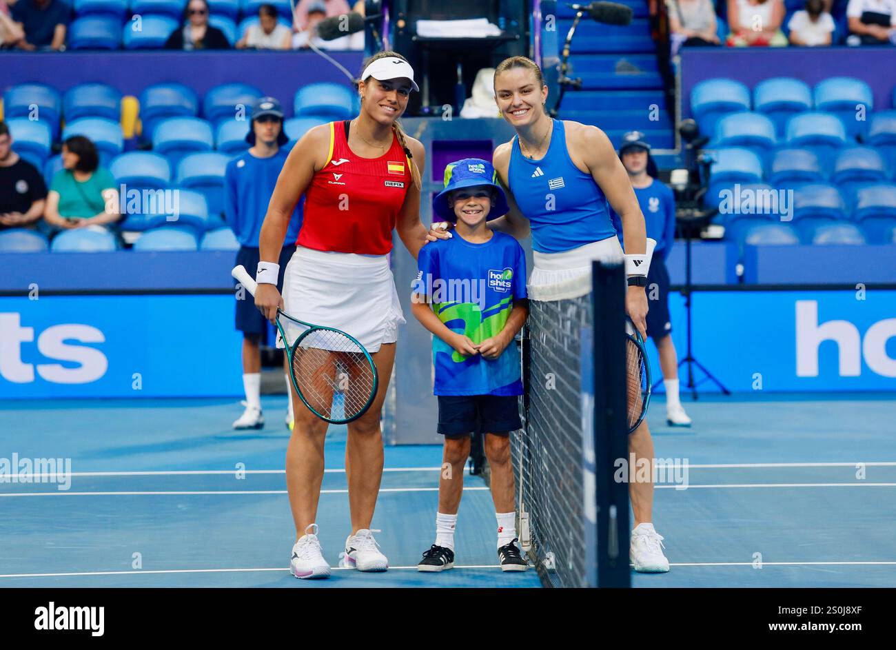 Perth, Australia. 28th Dec, 2024. Maria Sakkari (R) of Greece and ...