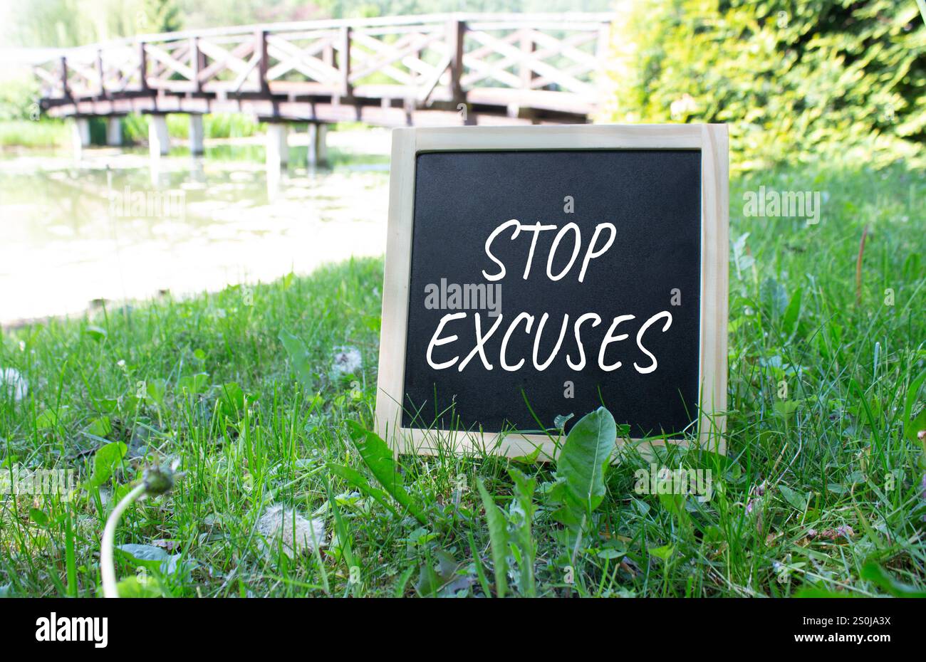 Stop excuses symbol. Concept word Stop excuses on black chalk ...