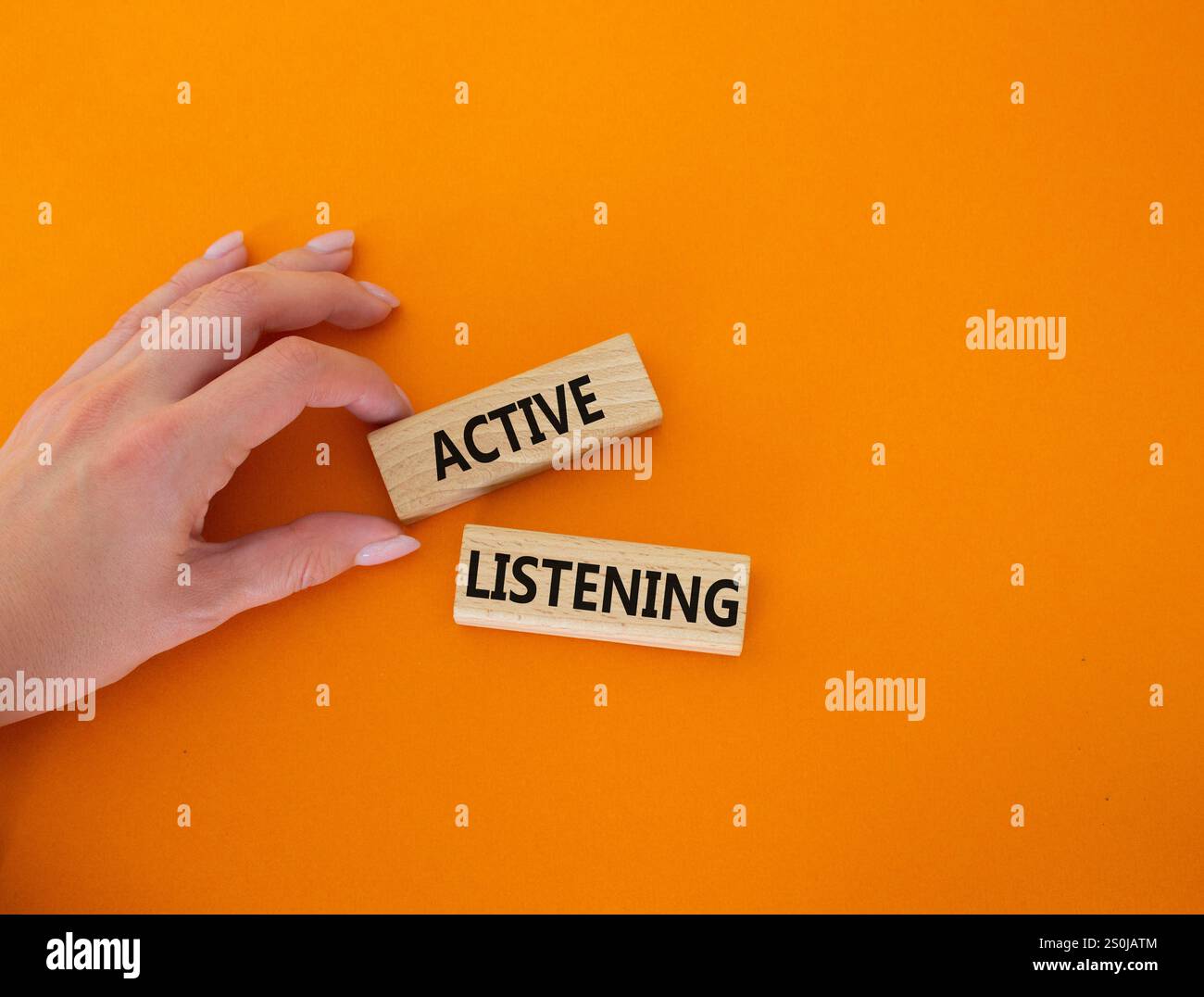 Active listening symbol. Wooden blocks with words Active listening ...