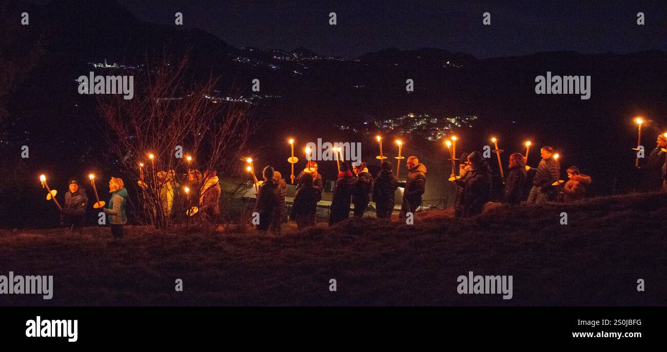 Serina Italy 24 December 2024: Traditional torchlight procession on ...