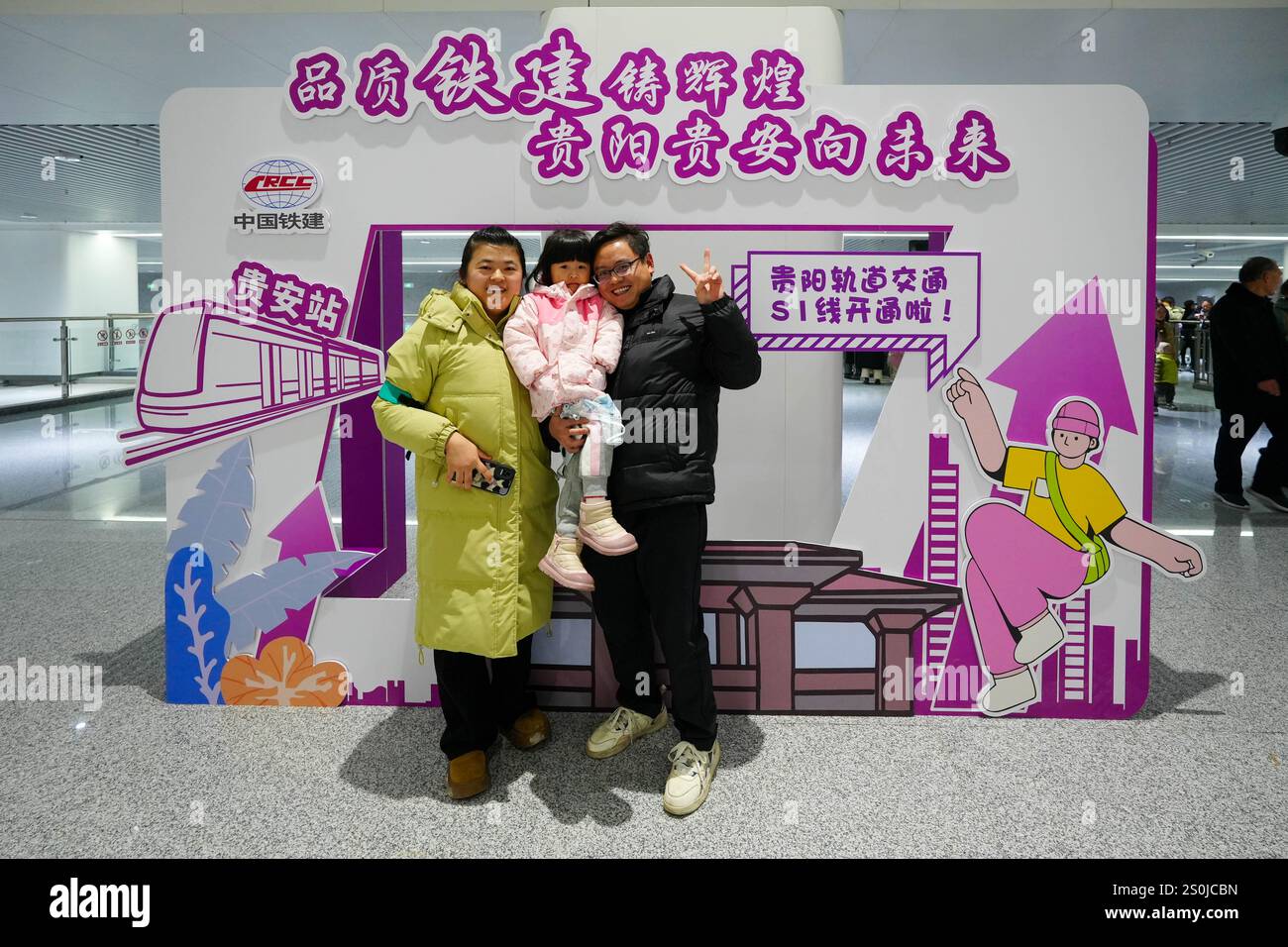 Guiyang, China's Guizhou Province. 28th Dec, 2024. People pose for ...