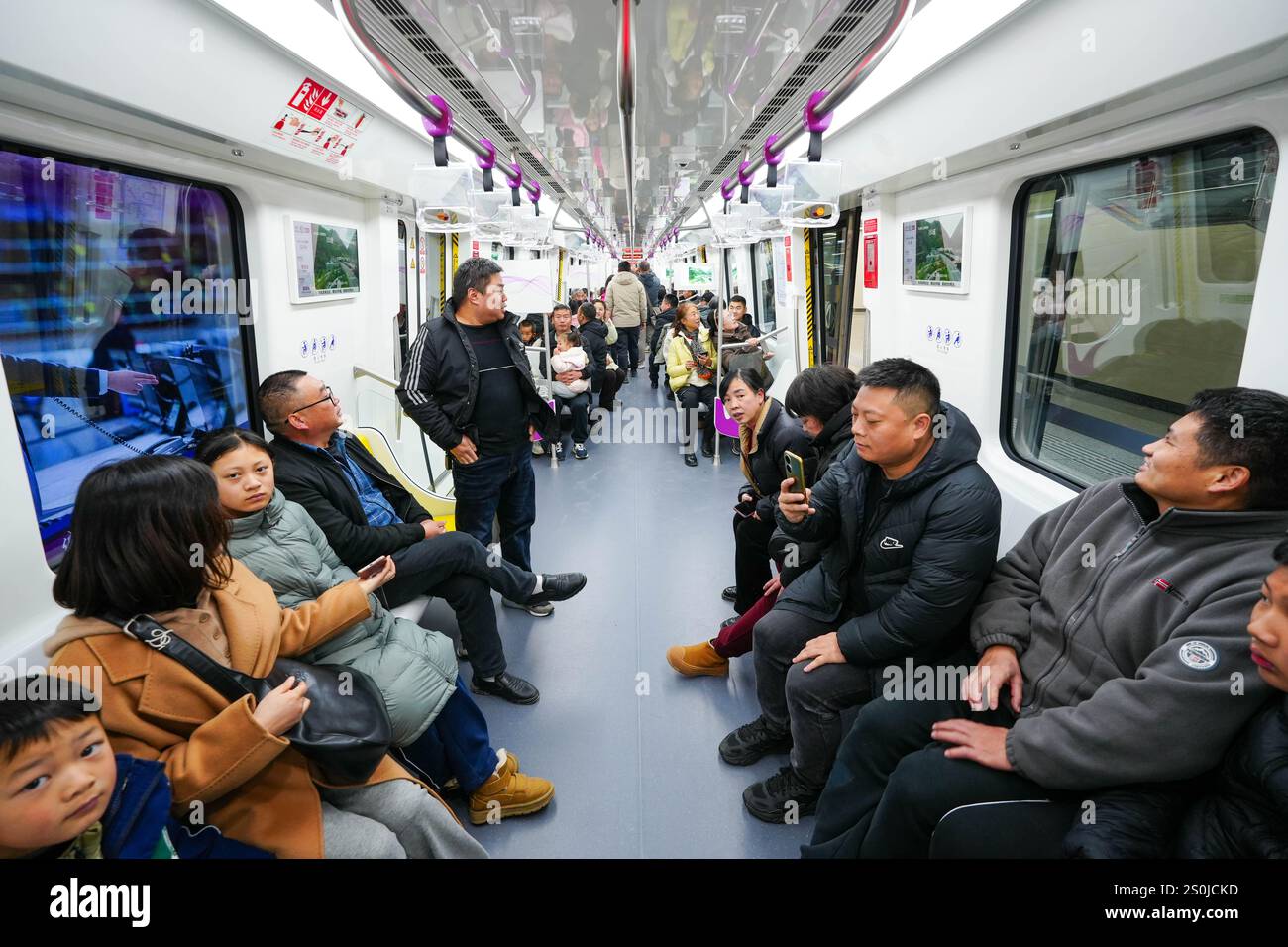 Guiyang, China's Guizhou Province. 28th Dec, 2024. People take a train ...
