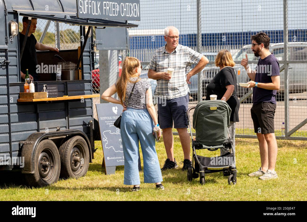 At the British Cold War Museum open day a family group by a food van ...