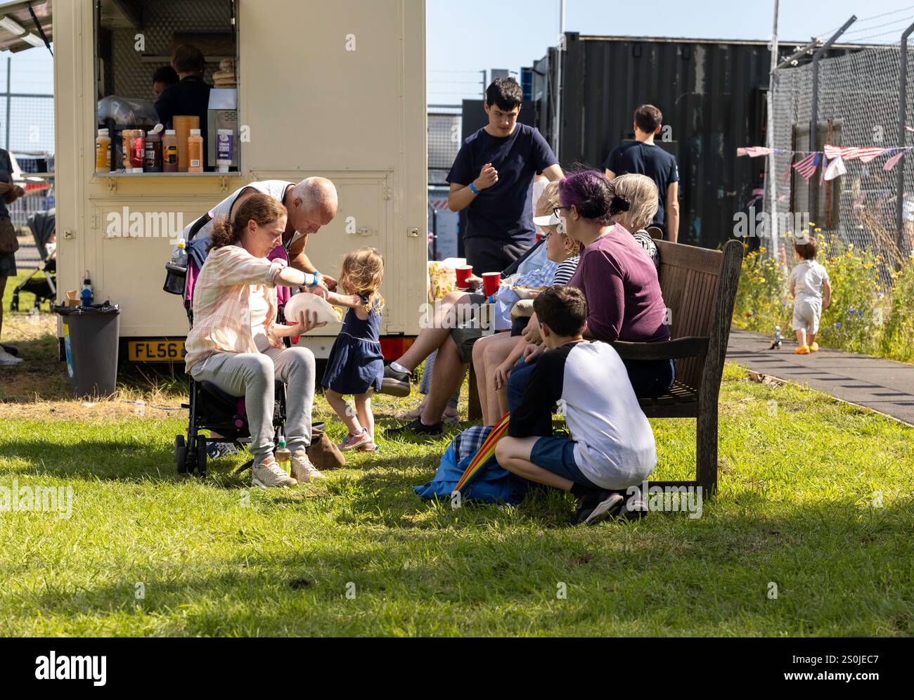 At the British Cold War Museum open day a family group by a food van ...