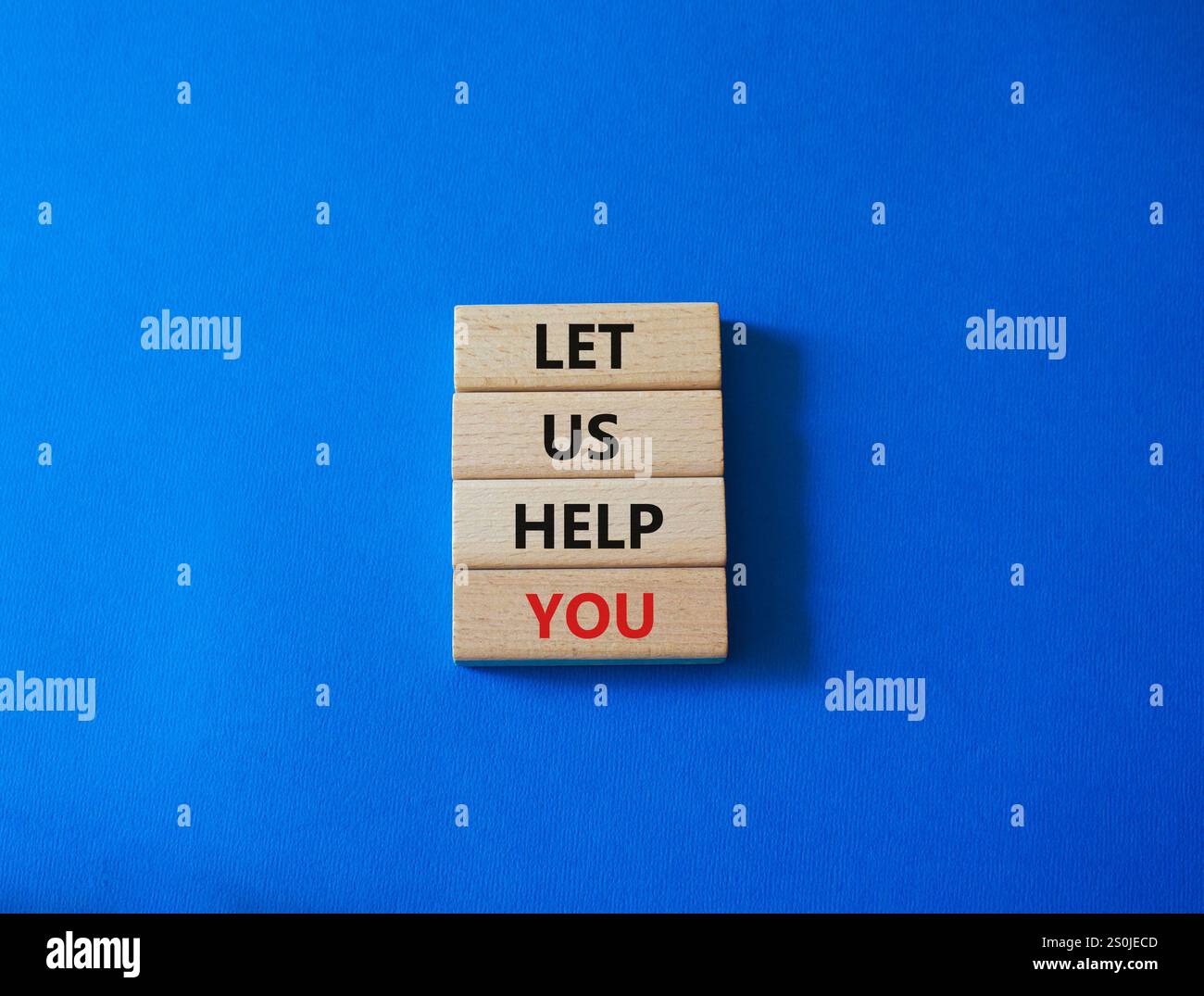 Let us help you symbol. Wooden blocks with words Let us help you ...