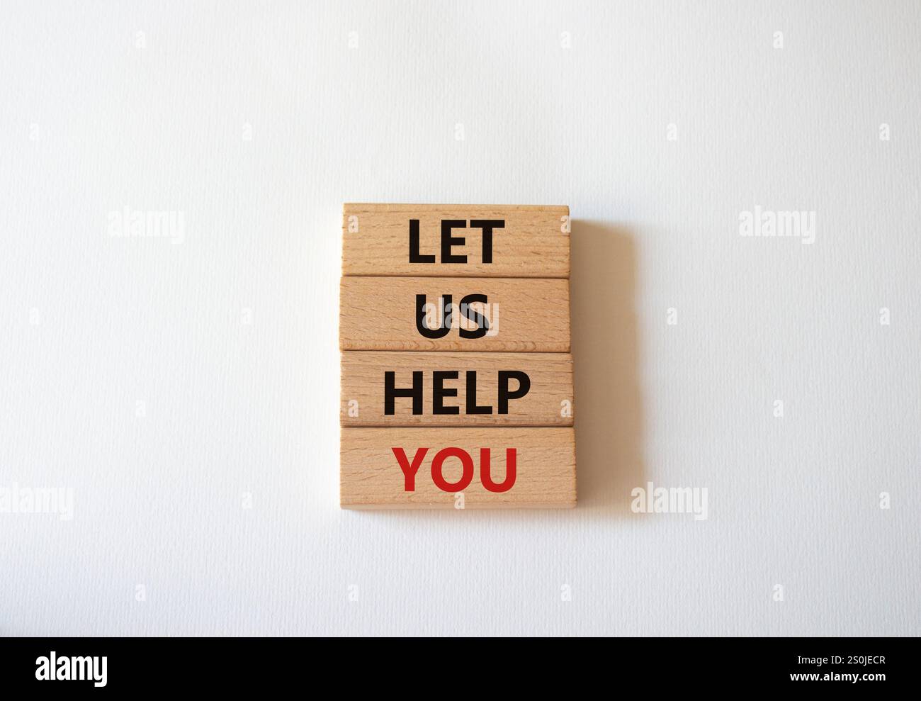 Let us help you symbol. Wooden blocks with words Let us help you ...