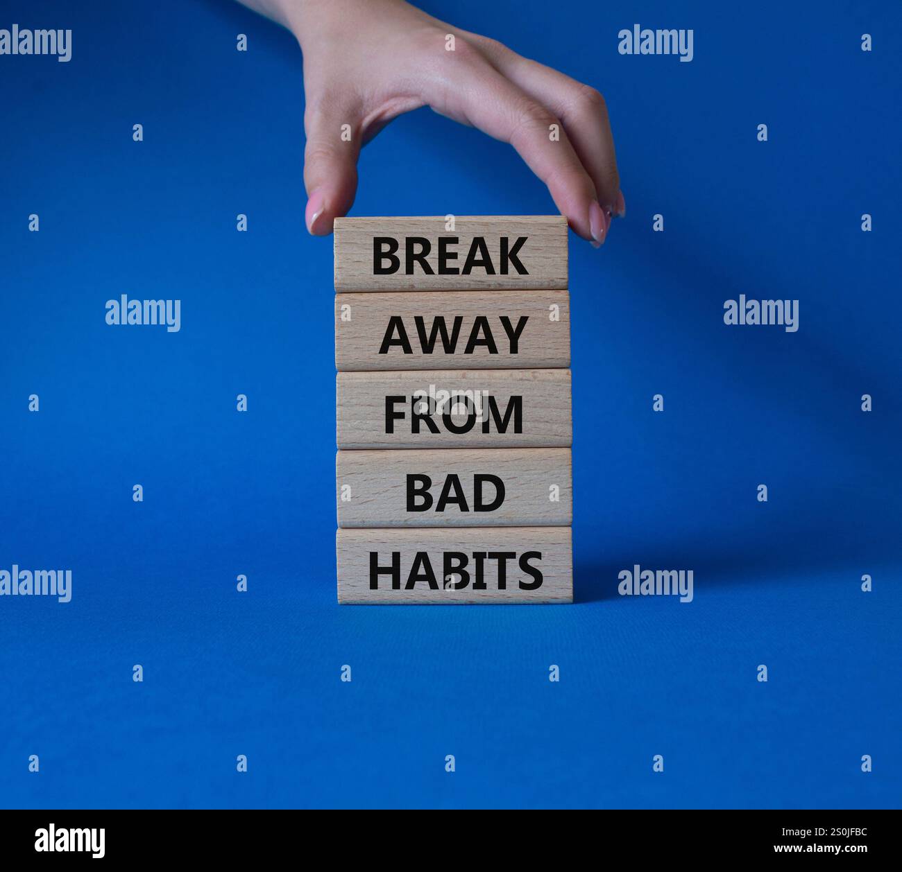 Break away from bad habits symbol. Wooden blocks with words Break away ...