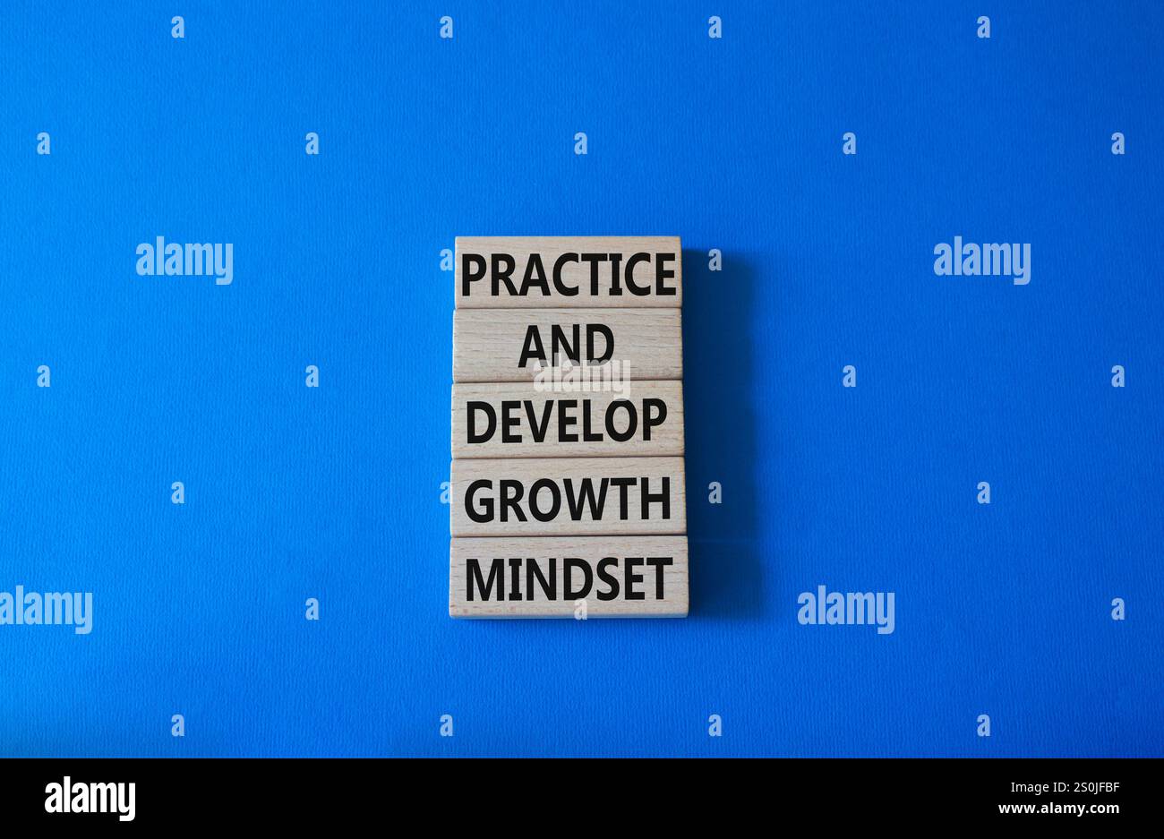 Practice and Develop growth mindset symbol. Wooden blocks with words ...