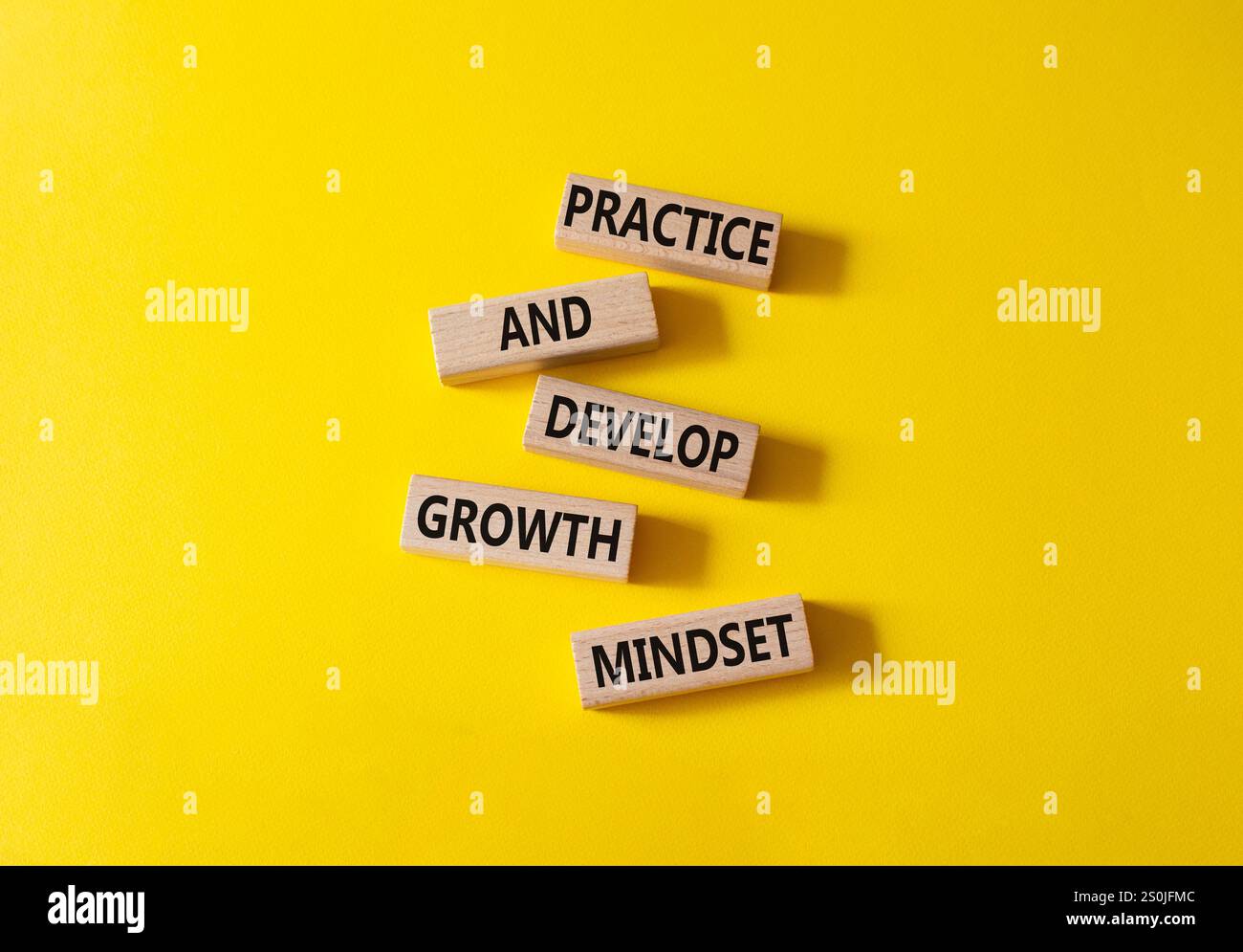Practice and Develop growth mindset symbol. Wooden blocks with words ...