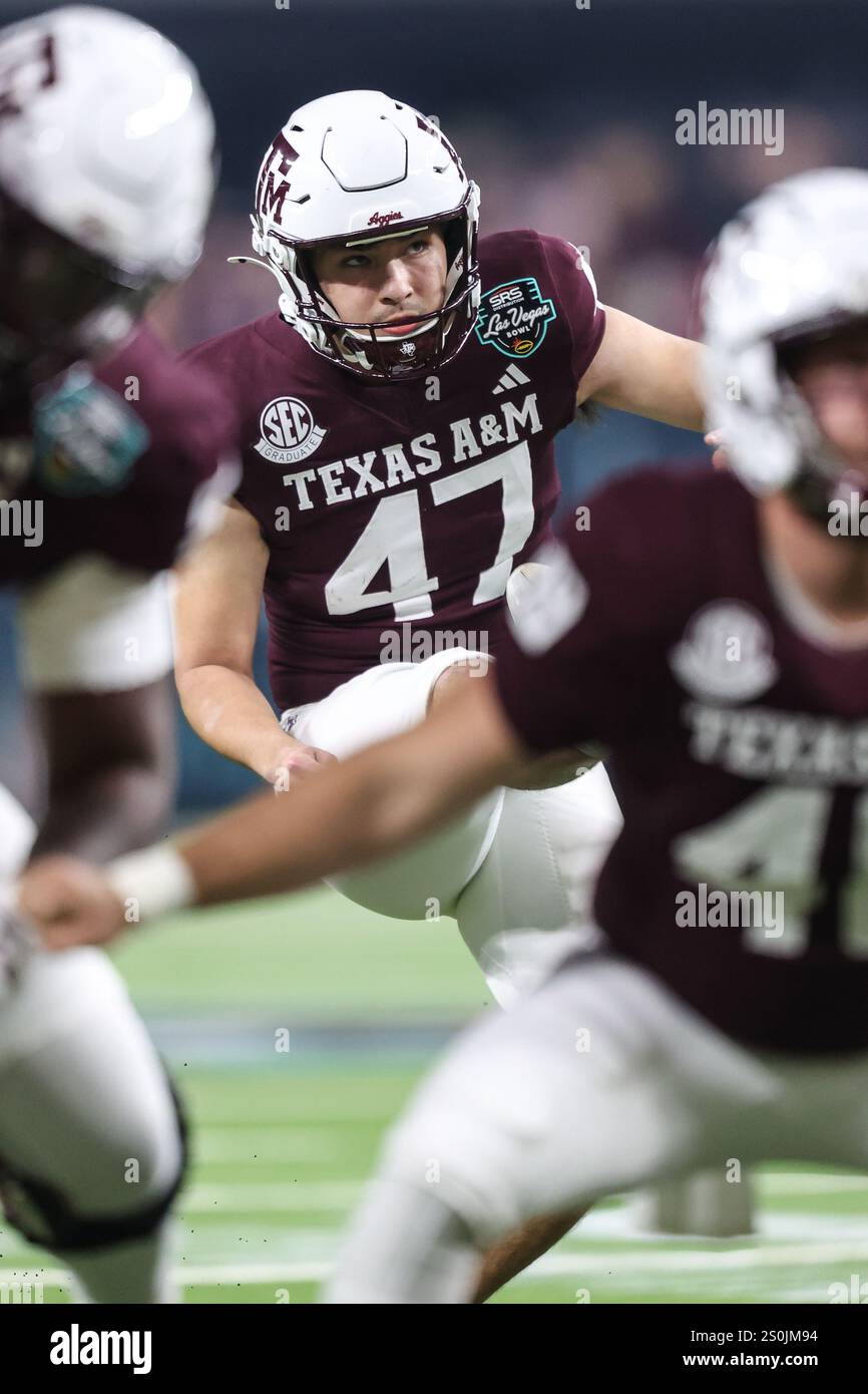 Las Vegas, USA. December 27, 2024: Texas A&M Aggies place kicker Randy ...