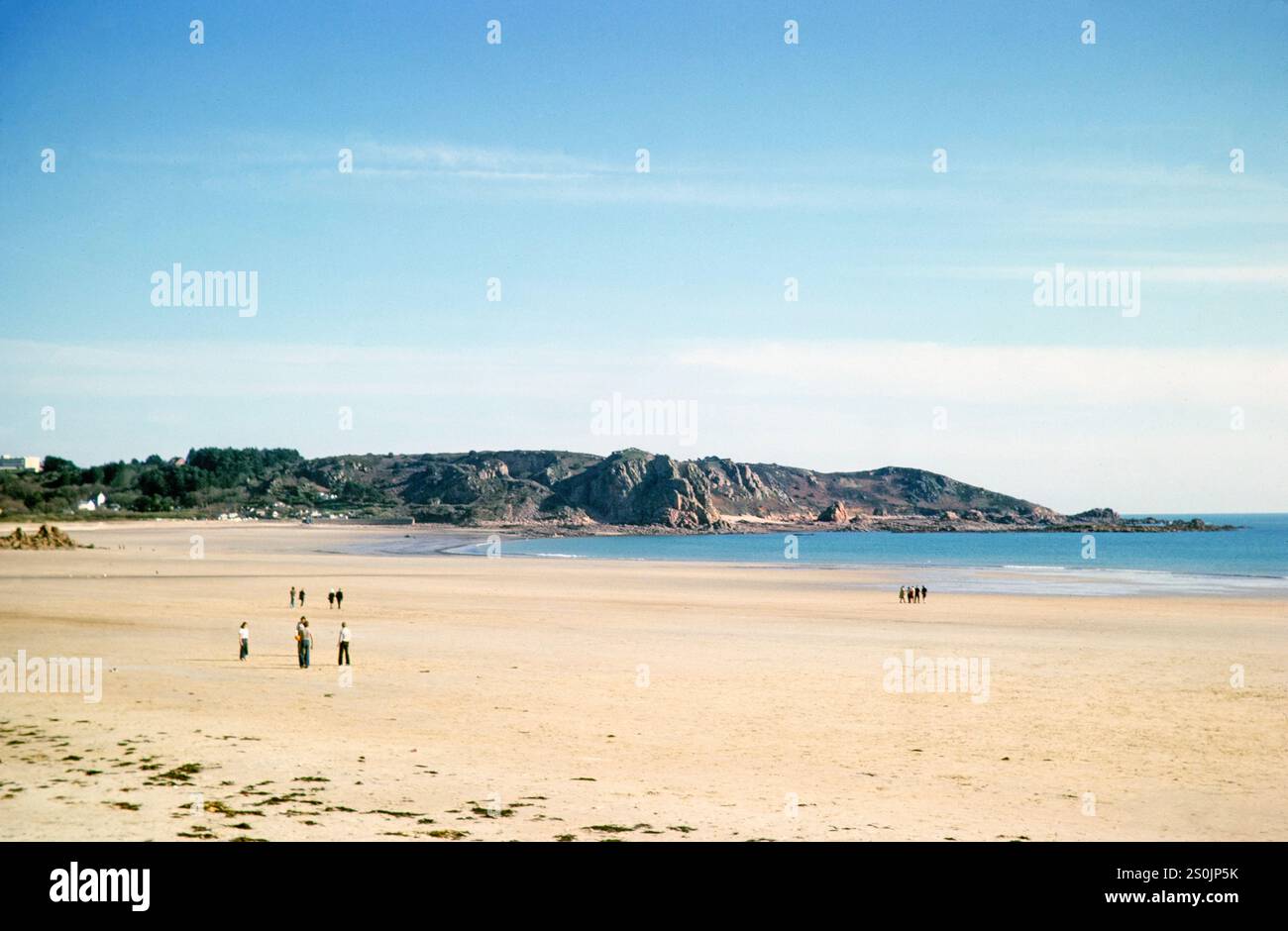 View to rocky headland of La Cotte de St Brélade Paleolithic site, St ...
