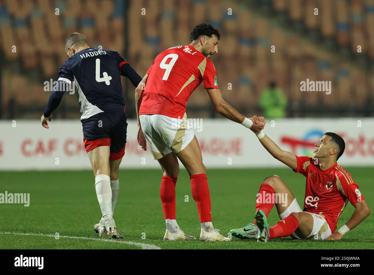 EGYPT, CAIRO, 22 December 2024 : Emam Ashour of Al Ahly SC, Wessam Abou Ali of Al Ahly SC during ...