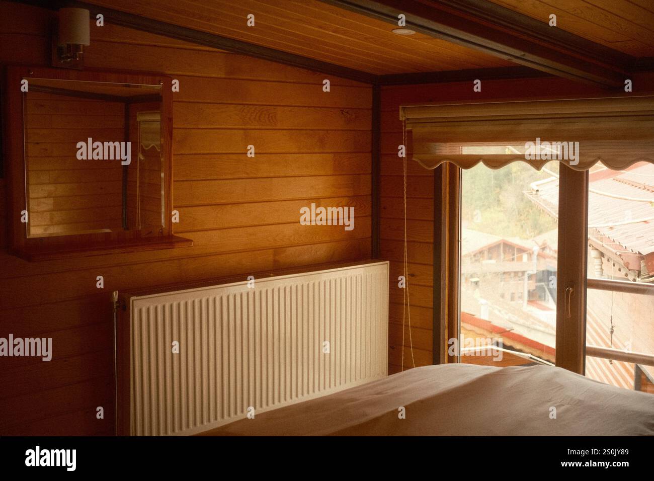 Vintage classic wooden interior with a heating radiator and natural ...