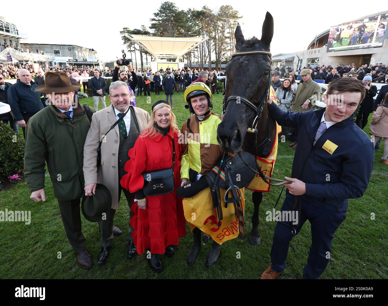 (Right to Left) Galopin Des Champs with Jockey Paul Townend, Owner, Mrs ...