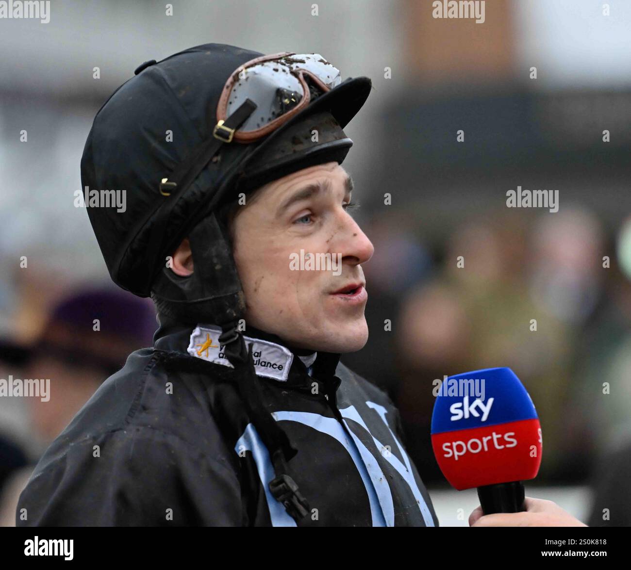 Newbury, UK. 28th Dec, 2024. Jockey Harry Skelton celebrates in the ...