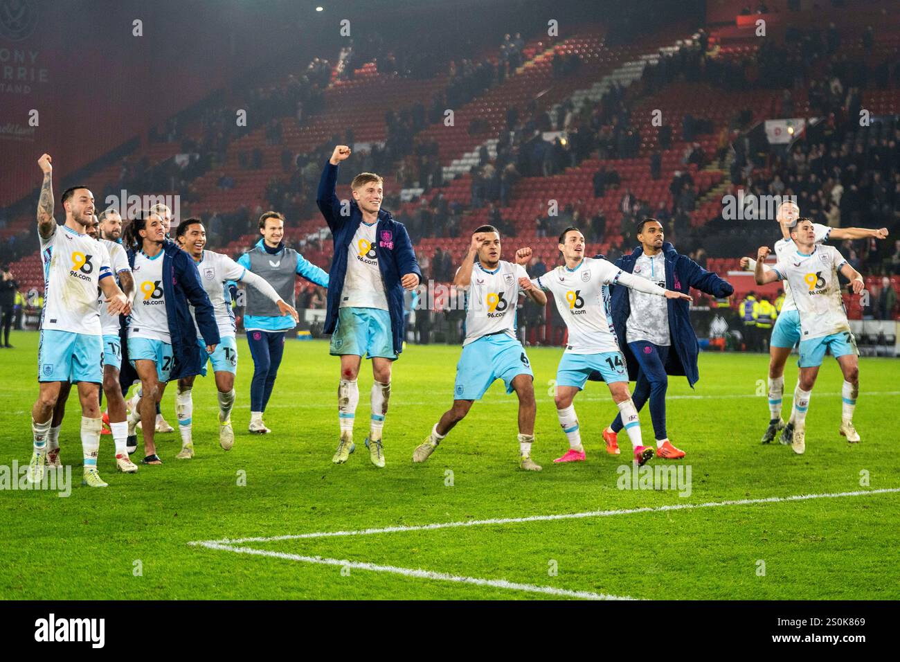 Burnley FC squad celebrate their win against Sheffield United after the ...