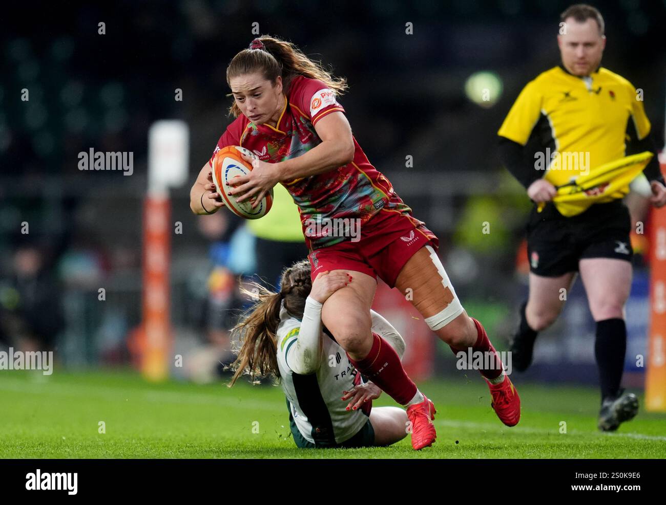Leicester Tigers' Claire Gallagher (rear) tackles Harlequins' Lisa ...
