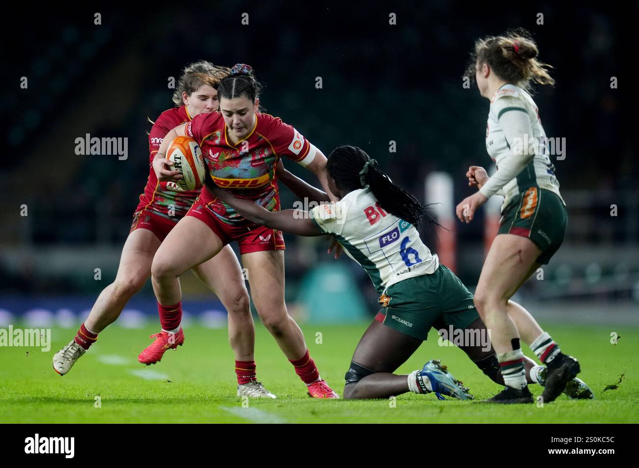 Harlequins' Sarah Parry (left) is tackled by Leicester Tigers' Julia ...