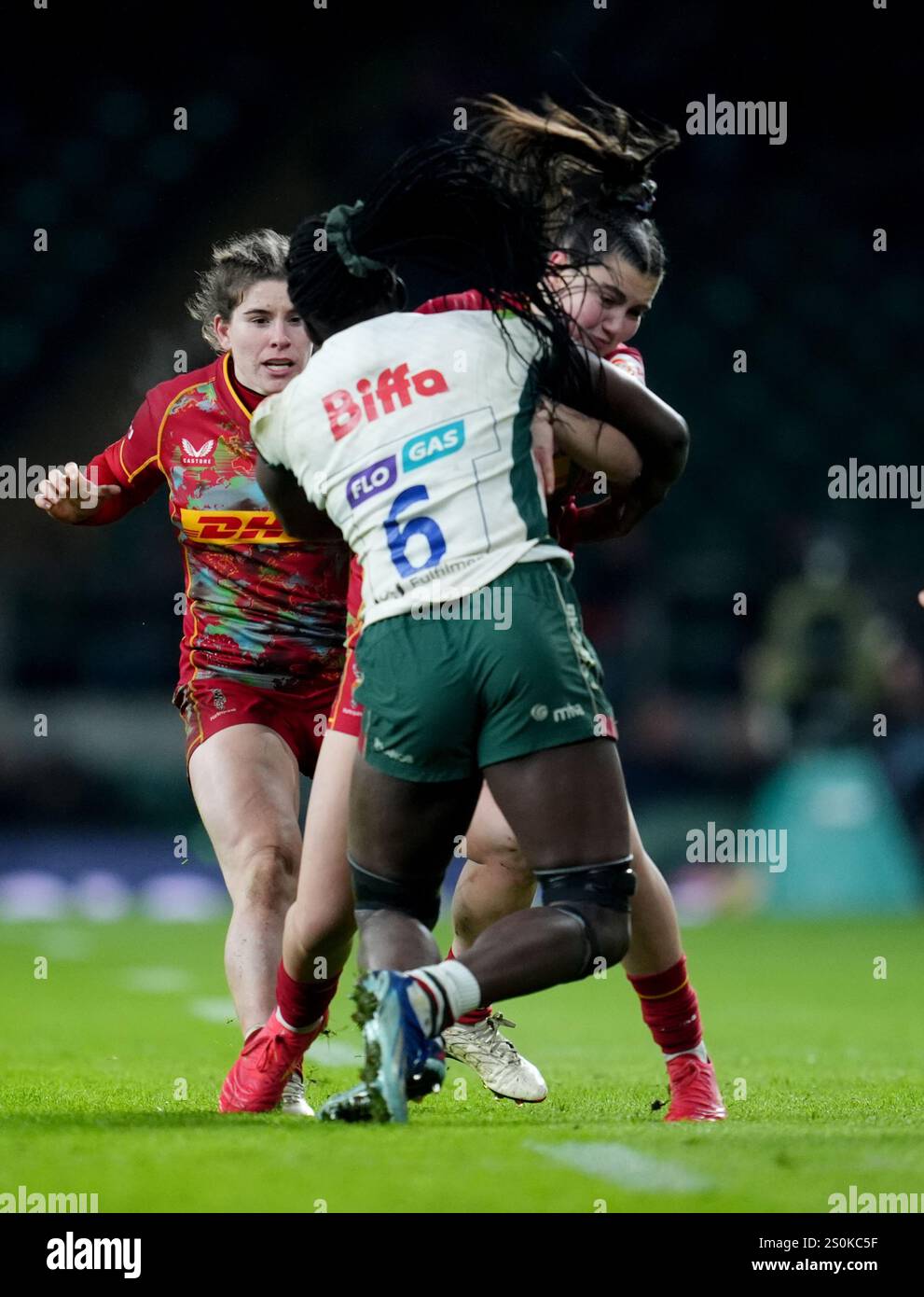 Harlequins' Sarah Parry (rear) is tackled by Leicester Tigers' Julia ...