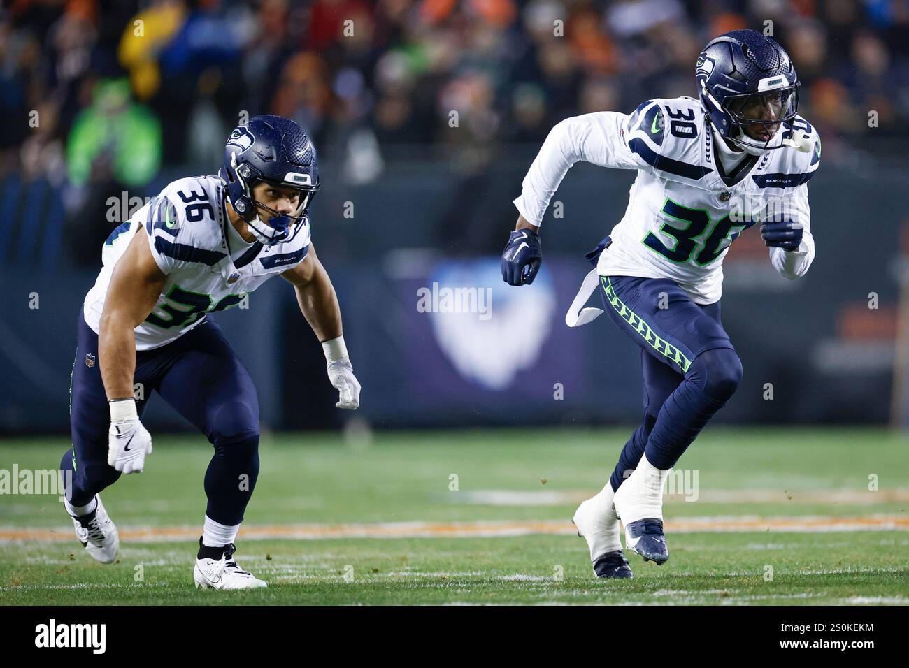 Seattle Seahawks running back George Holani (36) and safety AJ Finley ...