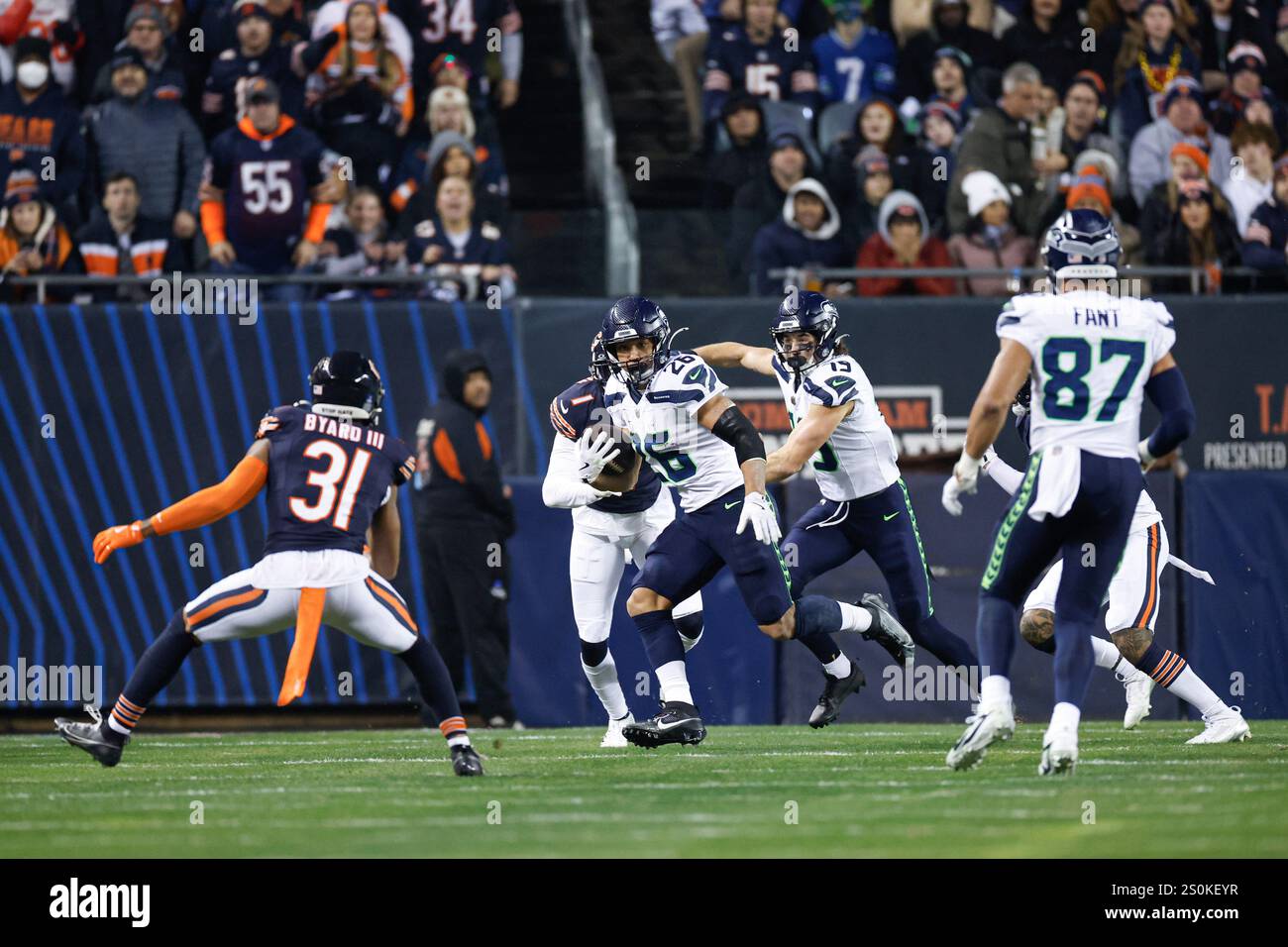 Seattle Seahawks running back Zach Charbonnet (26) runs with the ball ...