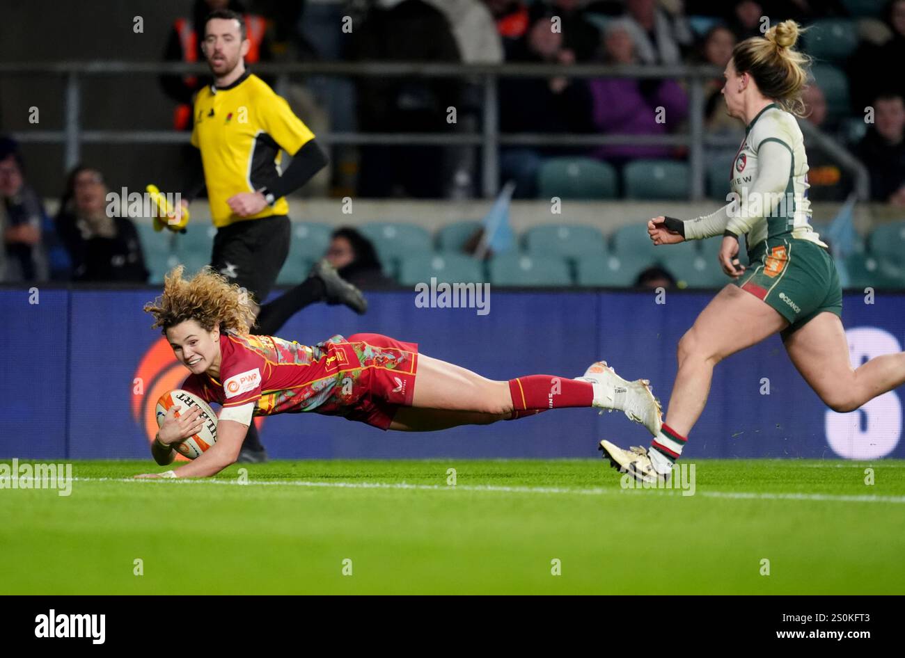Harlequins' Ellie Kildunne goes over for a try during the Premiership ...