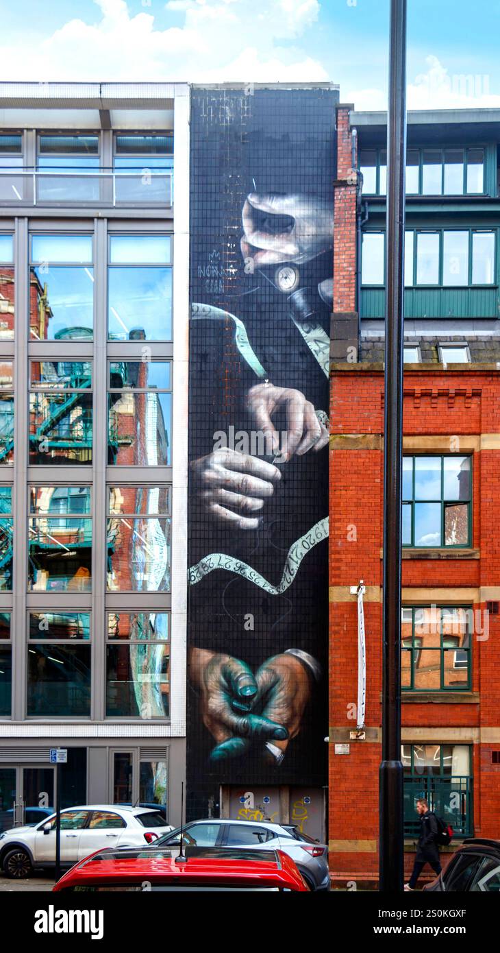 Make Do Mend by Nomad Clan street mural depicting manchester rag trade ...