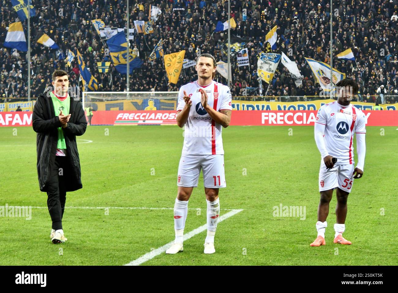 Parma, Italia. 28th Dec, 2024. AC Monza's Mirko Maric, Milan Djuric and ...