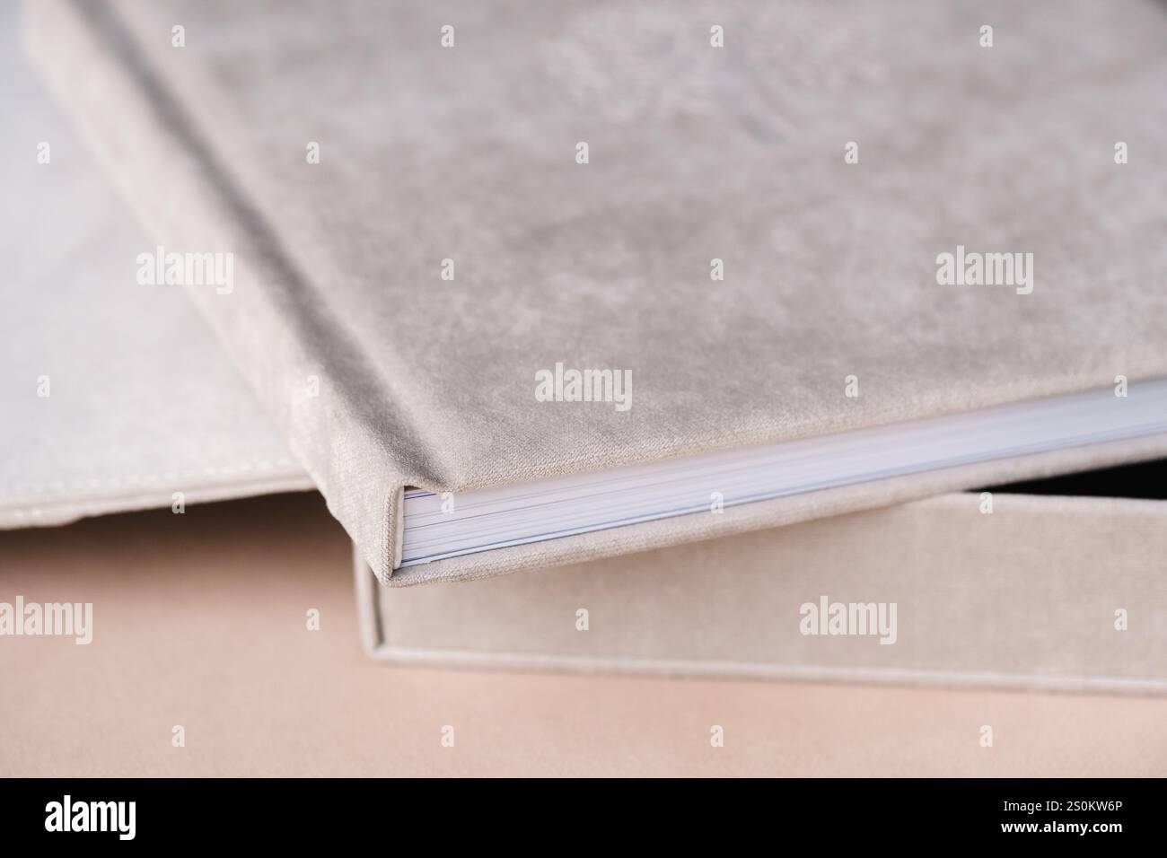 The photo book is grey in a soft cloth cover. the concept of creating ...