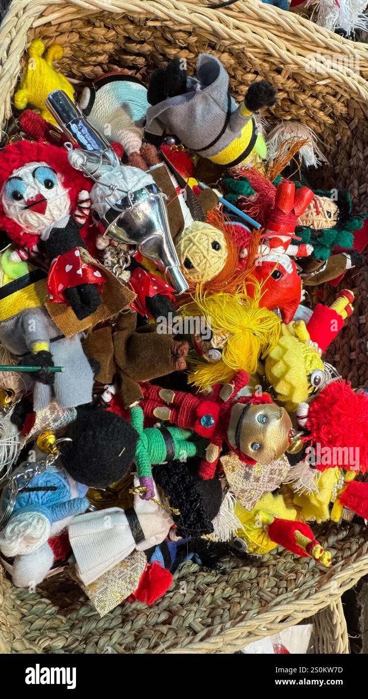 A wicker basket overflowing with a diverse collection of small ...