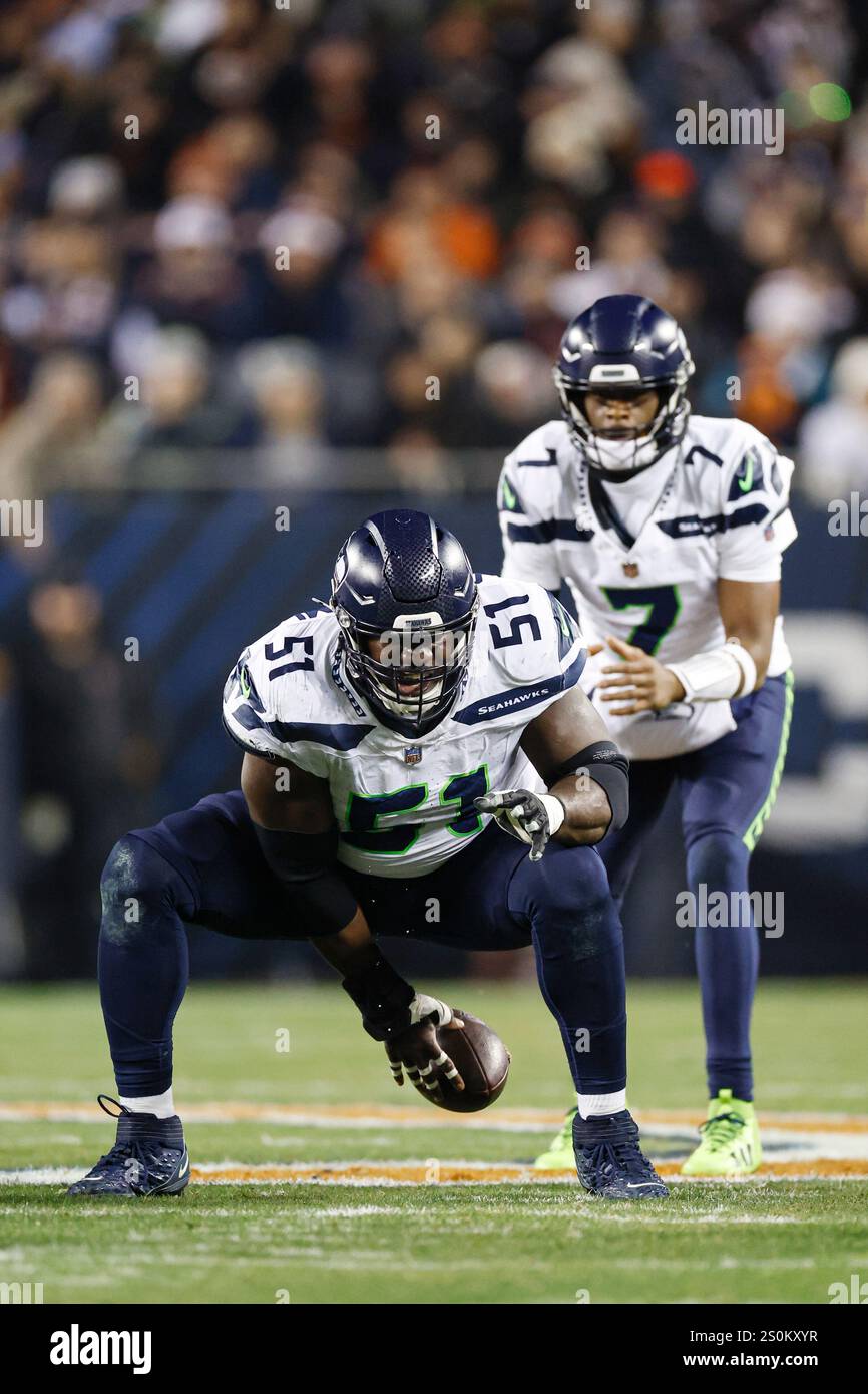 Seattle Seahawks center Olu Oluwatimi (51) snaps the ball to ...