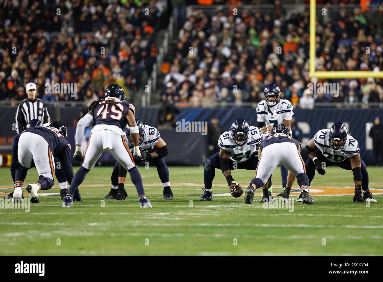 Seattle Seahawks center Olu Oluwatimi (51) snaps the ball to ...