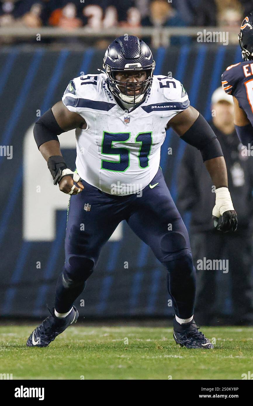 Seattle Seahawks center Olu Oluwatimi (51) blocks during the first half ...
