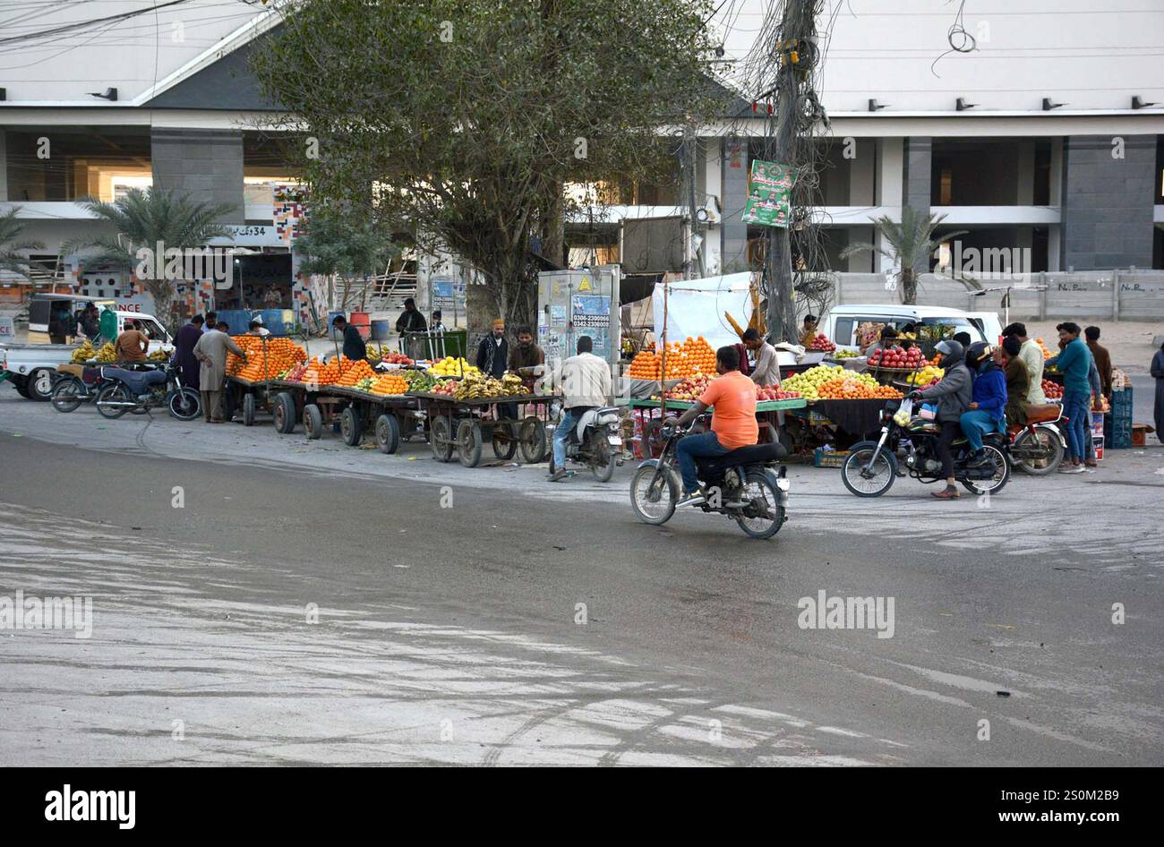 View of illegal encroachment on the road and footpath causing of ...