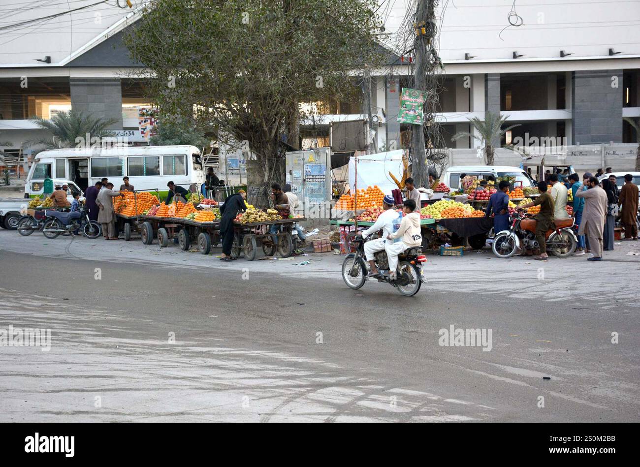 View of illegal encroachment on the road and footpath causing of ...