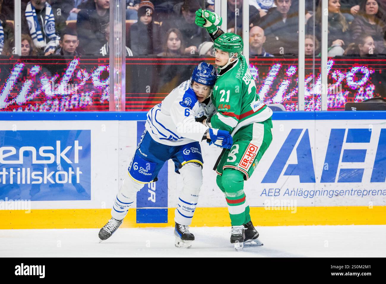 241228 Leksands Alexander Lundqvist och Joonas Lyytinen jublar under ishockeymatchen i SHL ...