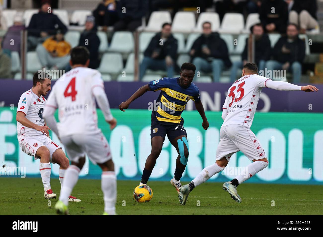 Parma, Italy. 28th Dec 2024. Samuele Birindelli (Monza)Drissa Camara ...