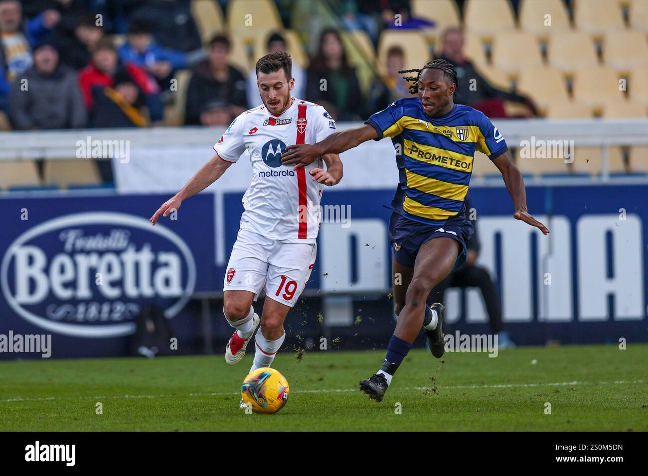 Parma, Italy. 28th Dec 2024. Samuele Birindelli (Monza)Woyo Coulibaly ...