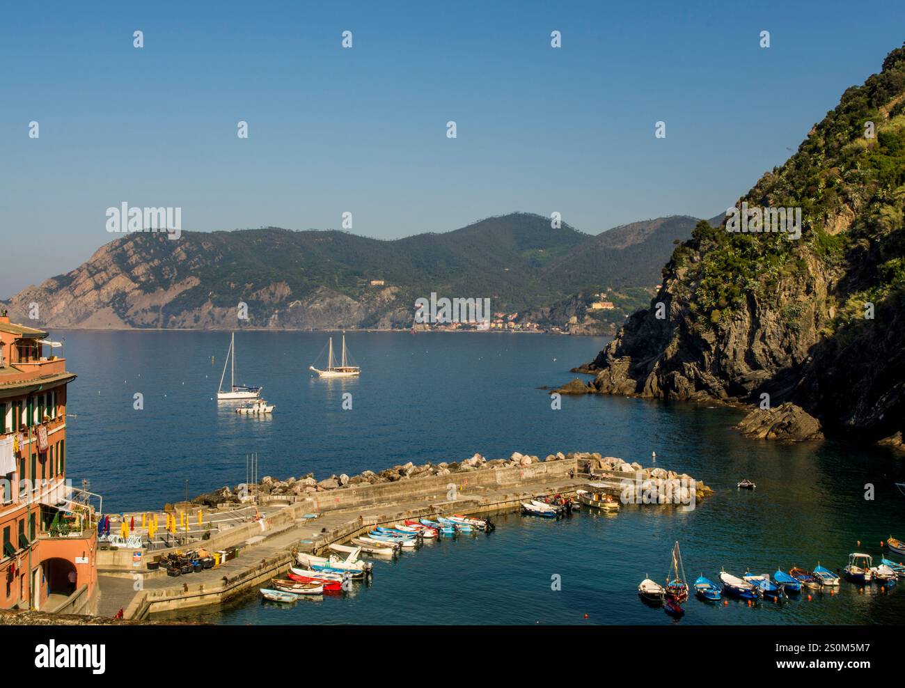 Vernazza harbor with Monterosso al Mare in distance, La Spezia, Cinque ...