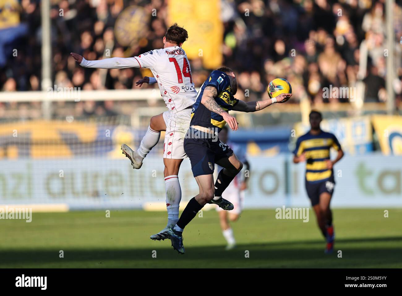 Parma, Italy. 28th Dec 2024. Daniel Maldini (Monza)Antoine Hainaut ...