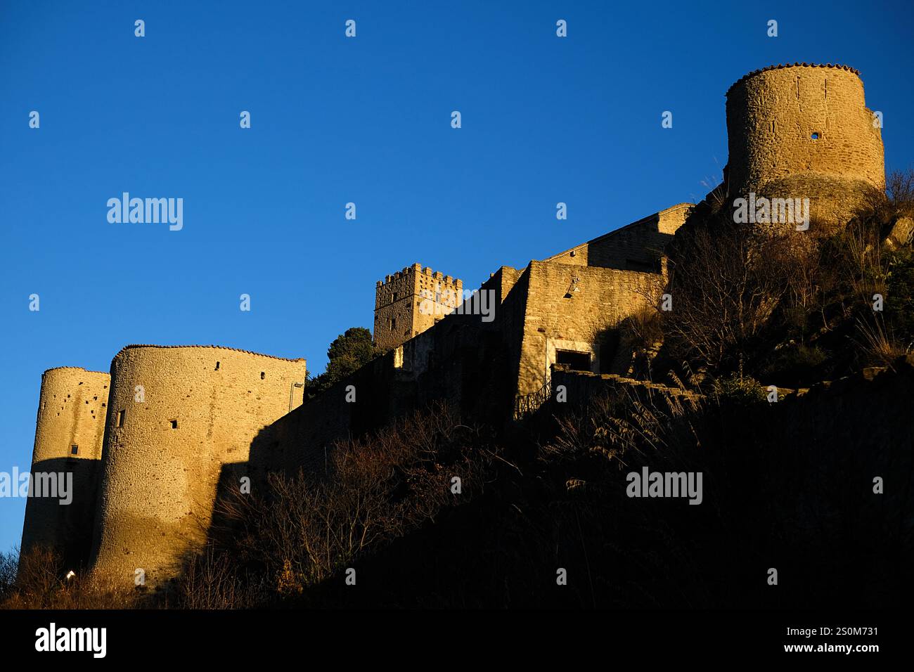A view of the Castle of Roccascalegna in the town of Roccascalegna in ...