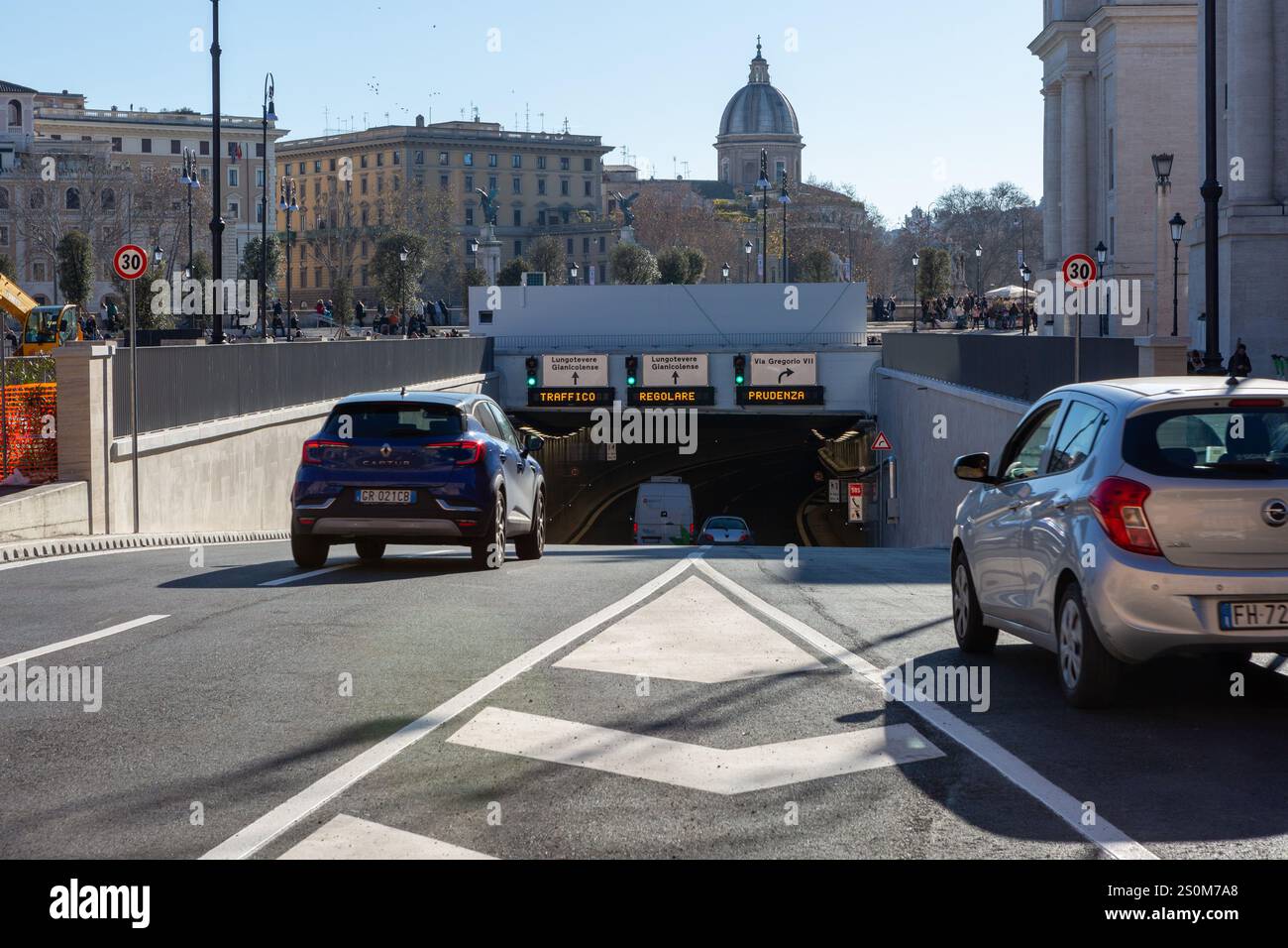 Traffic disappears into the new extension of the tunnel which runs ...